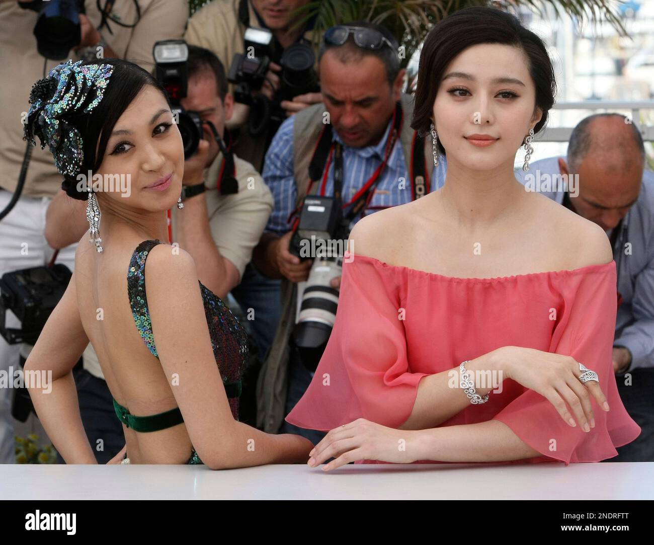 Actress Fan Bingbing, right, and actress Li Feier, left, pose for ...