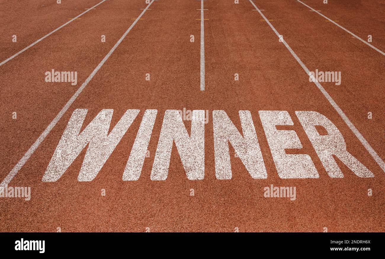Winner written on running track, New Concept on running track text in white color Stock Photo ...