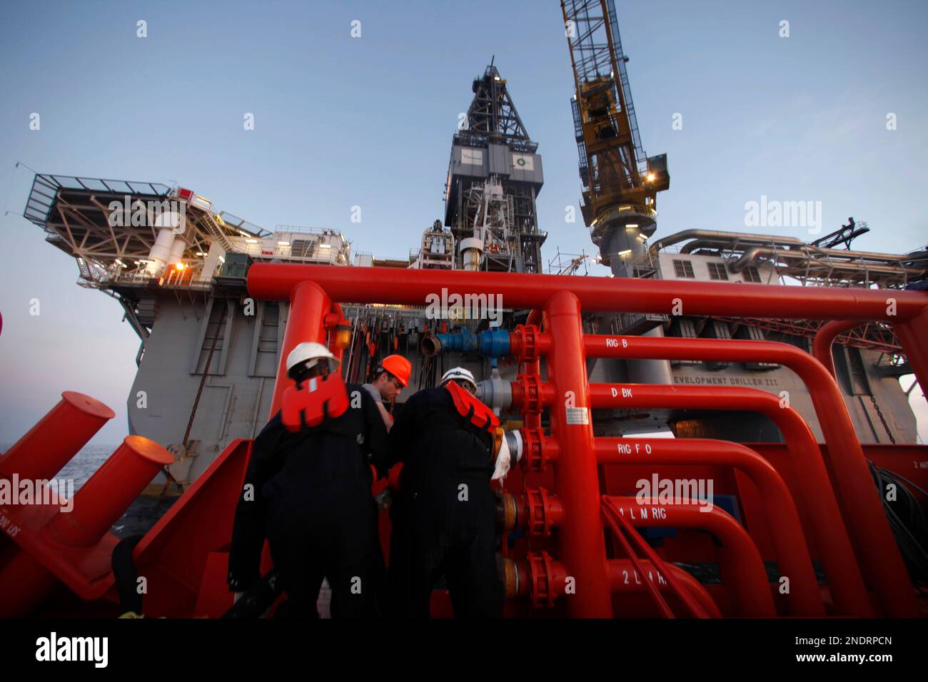 Service vessel Joe Griffin crew members Corey Washington, left, Kevin ...