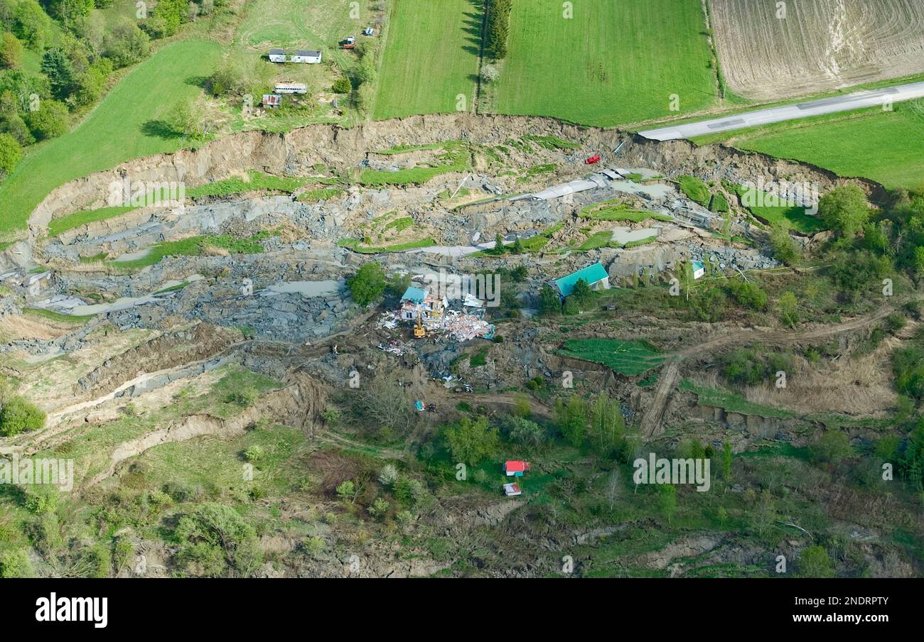 Rescuers work at the scene of a landslide in Saint-Jude, Quebec as ...