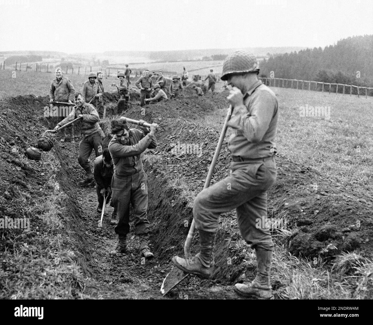 Somewhere in Belgium, Oct. 19, 1944 American infantrymen dig in along ...
