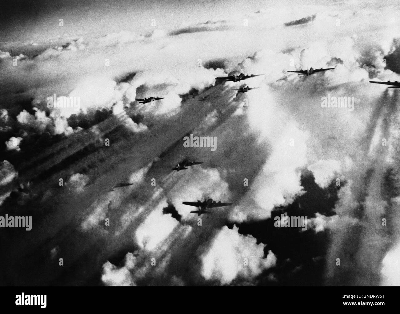 American Flying Fortresses approaching their target. Vapour trails ...