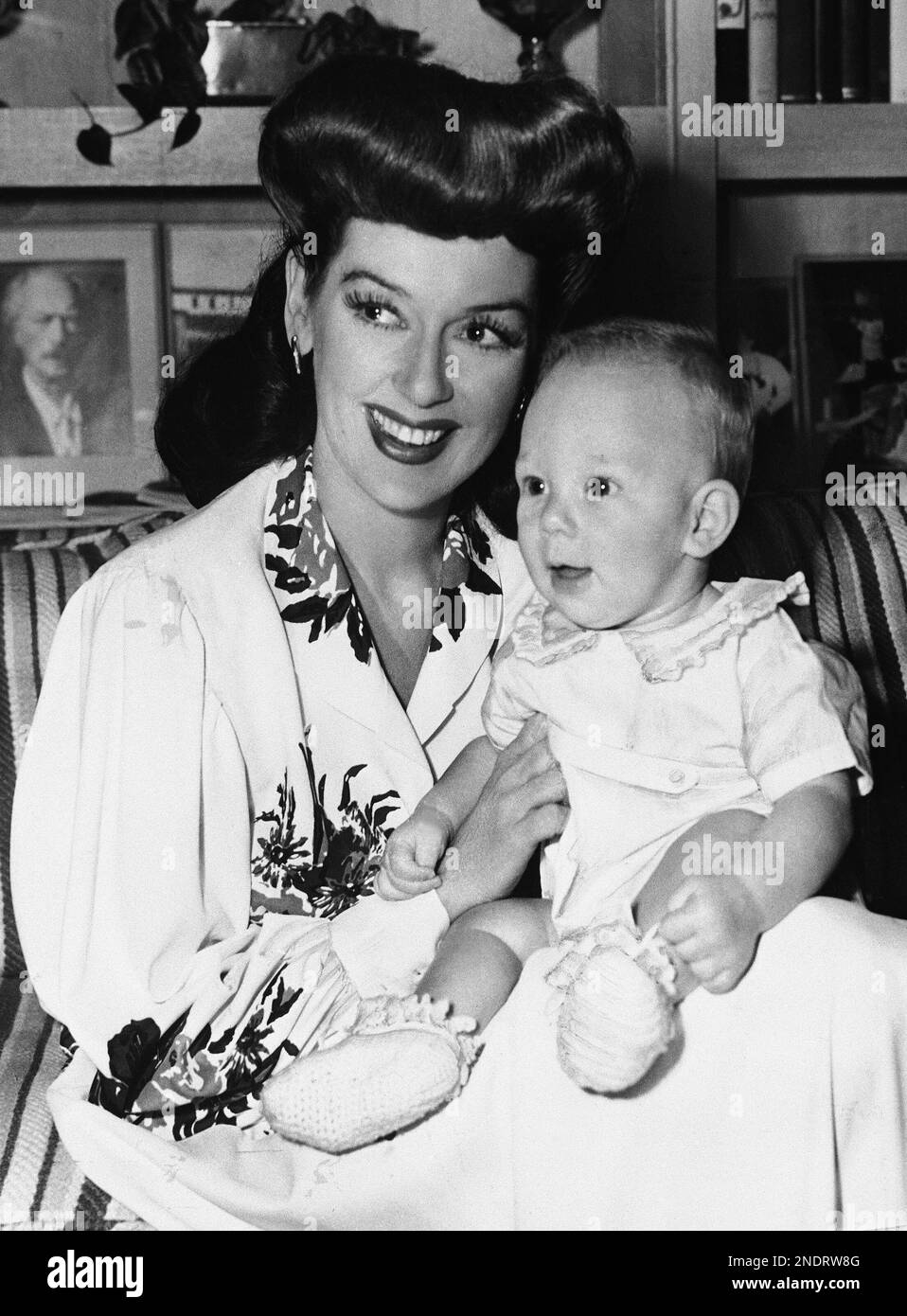 Carl Lance Brisson, who was six months old, shows of his nicest smile ...