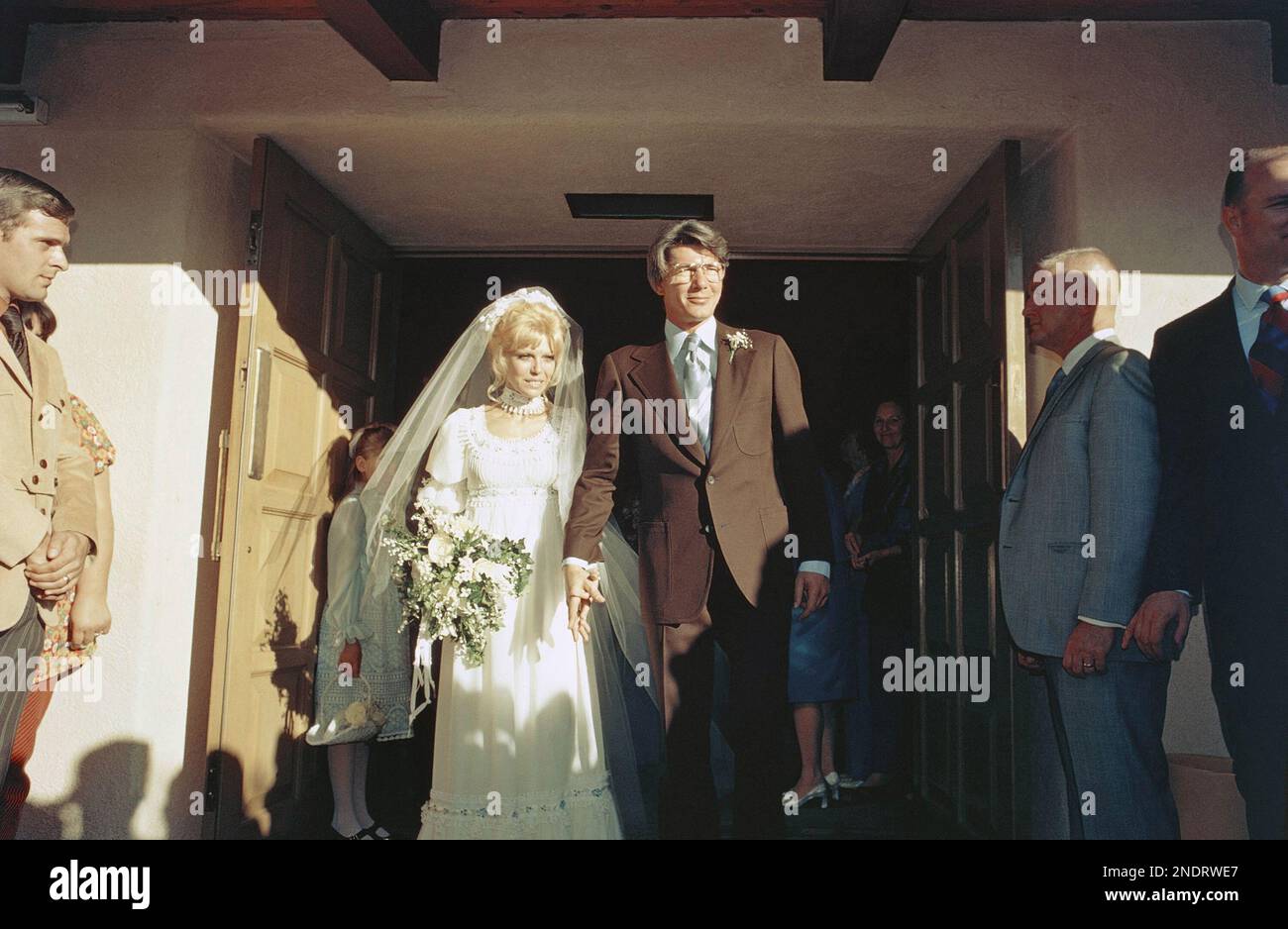 Nancy Sinatra and her new husband, Hugh Lambert, are shown at their ...