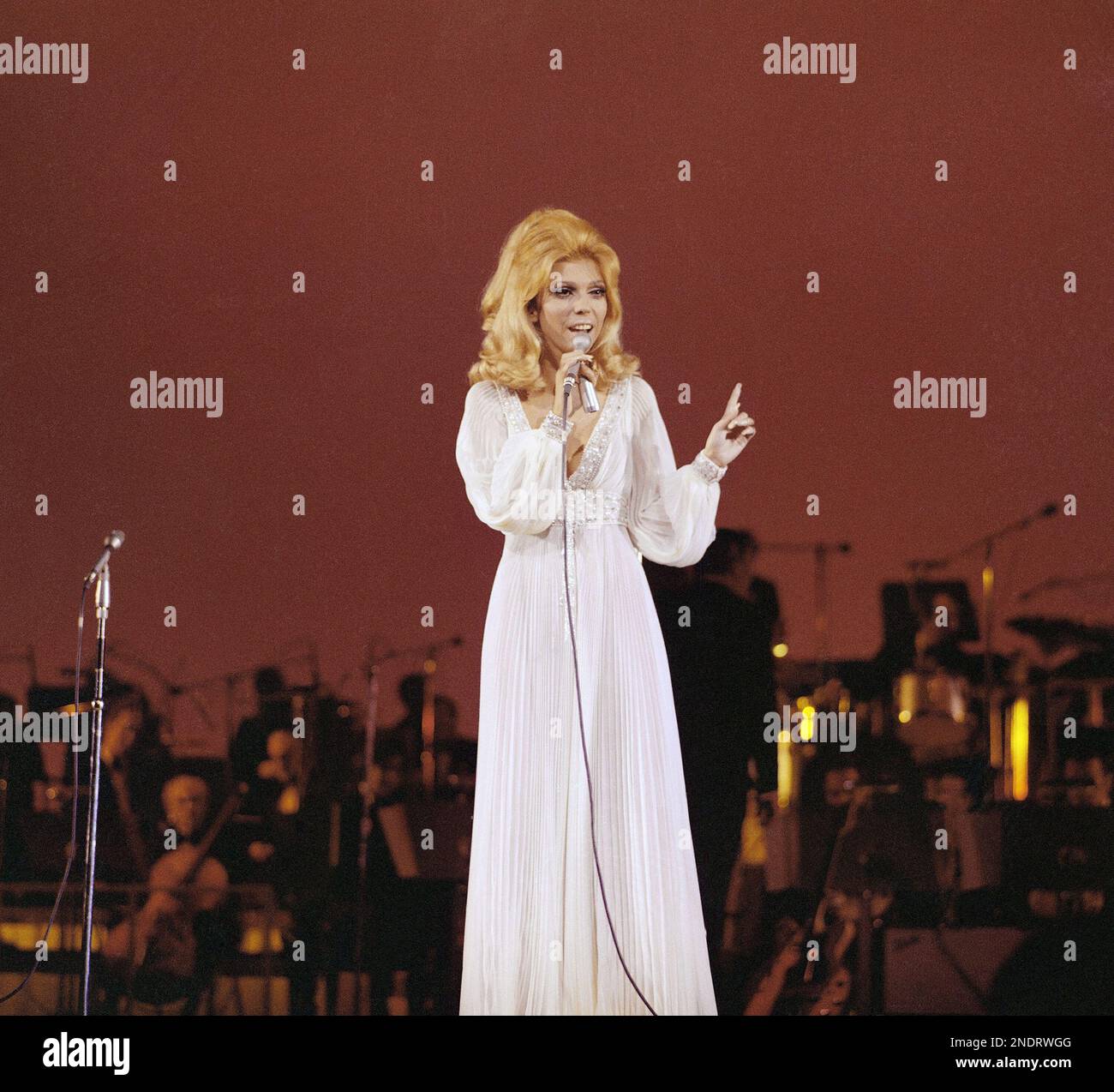 Pop singer Nancy Sinatra is shown performing at her opening in Las ...