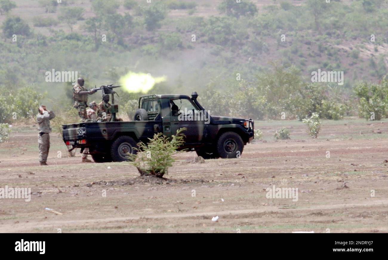 Malian troops fire live rounds from a Russian-made "Dushka" heavy ...
