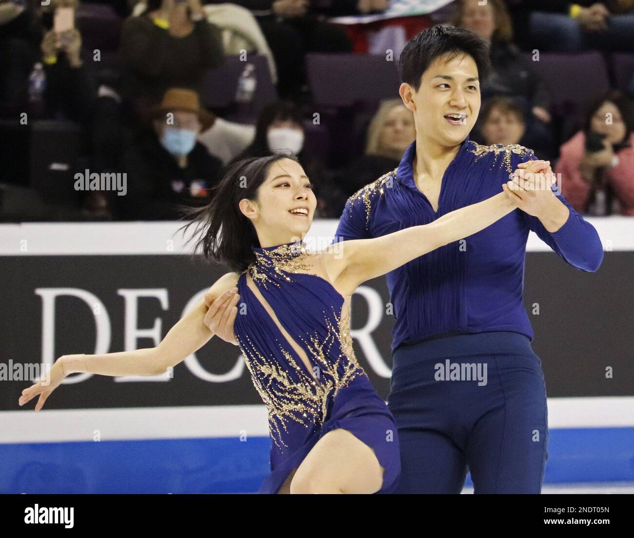 Japan's Riku Miura (L) and Ryuichi Kihara perform in the pairs short ...