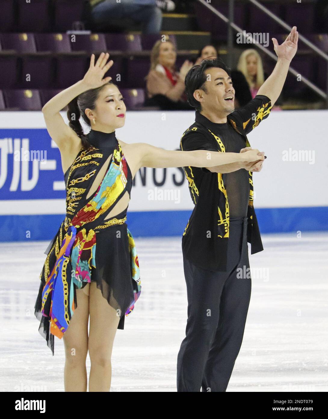 Japan's Kana Muramoto (L) and Daisuke Takahashi acknowledge spectators ...