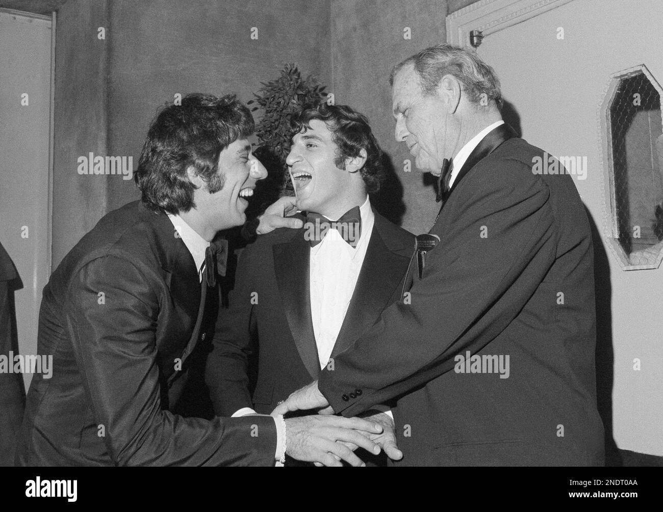 New York Jets quarterback Joe Namath, left, shares a laugh with Johnny ...
