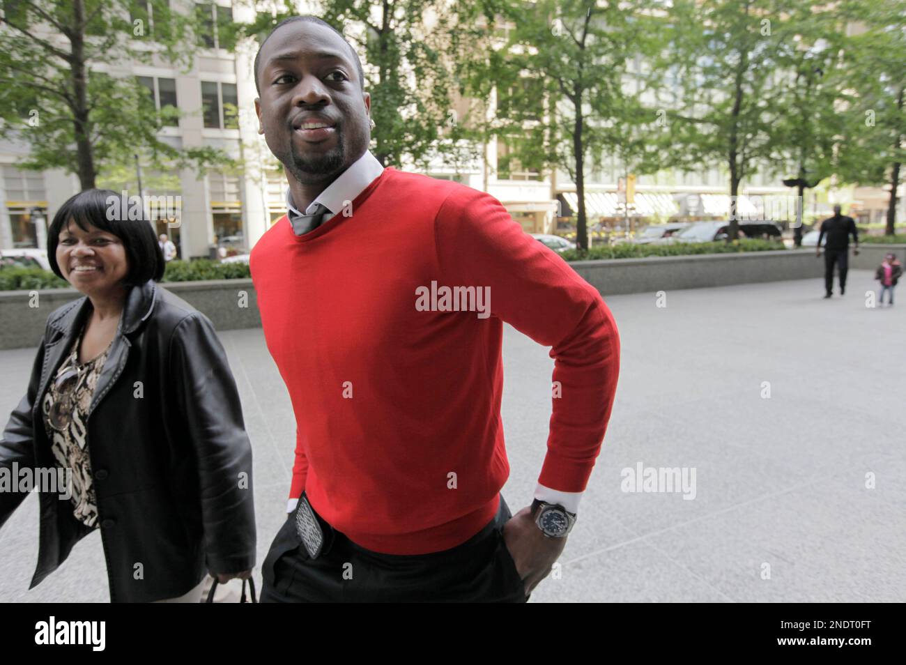 Miami Heat guard Dwyane Wade and his mother, Jolinda Wade, enter the ...