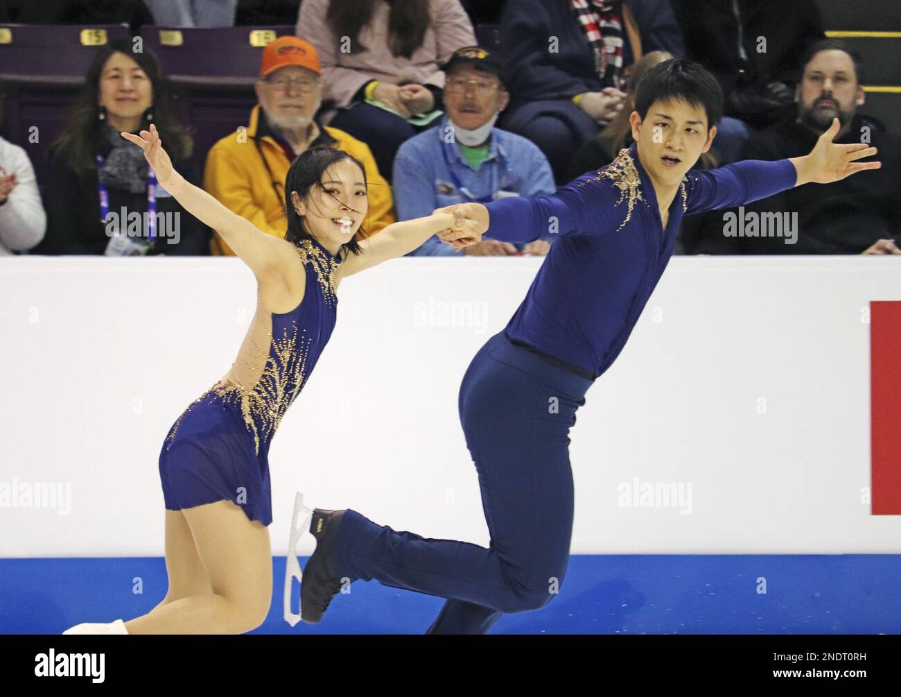 Japan's Riku Miura (L) and Ryuichi Kihara perform in the pairs short ...
