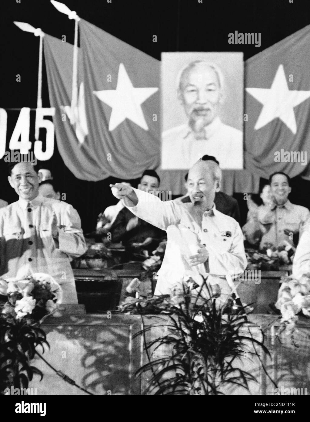 North Vietnamese leader Ho Chi Minh stands with other high ranking ...