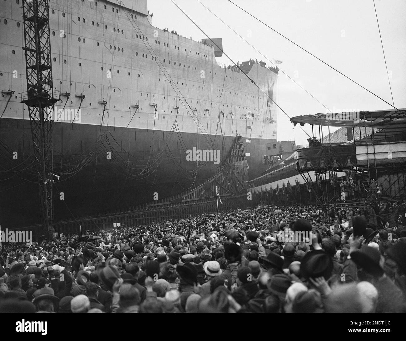 Crowds gather to watch the launch of the RMS Queen Mary the world’s ...