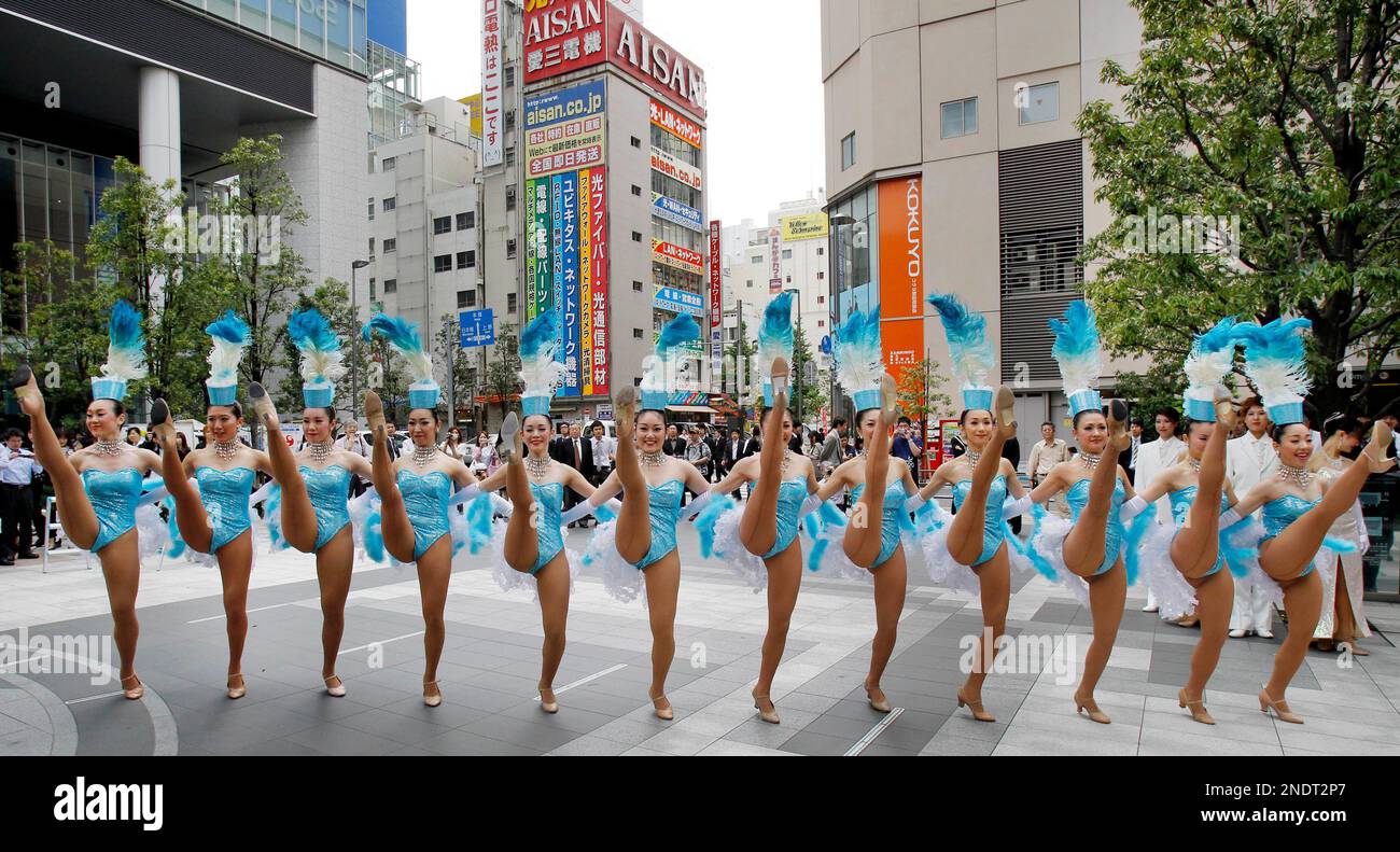 Dancers from the Japanese dance troupe STAS perform leg kicks to ...