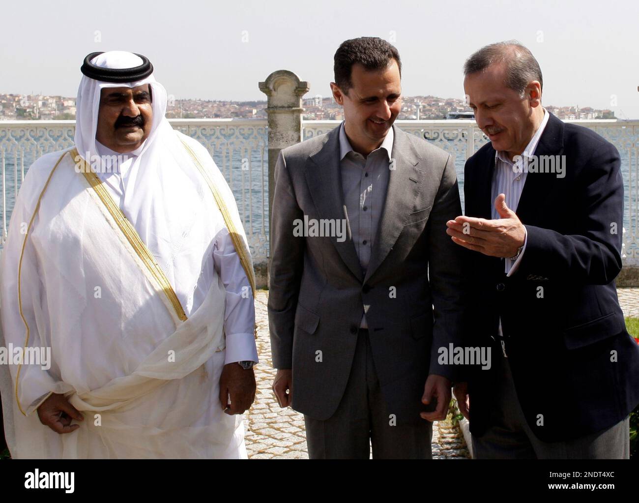 From left, Qatar's Emir Sheik Hamad bin Khalifa Al-Thani, Syrian ...