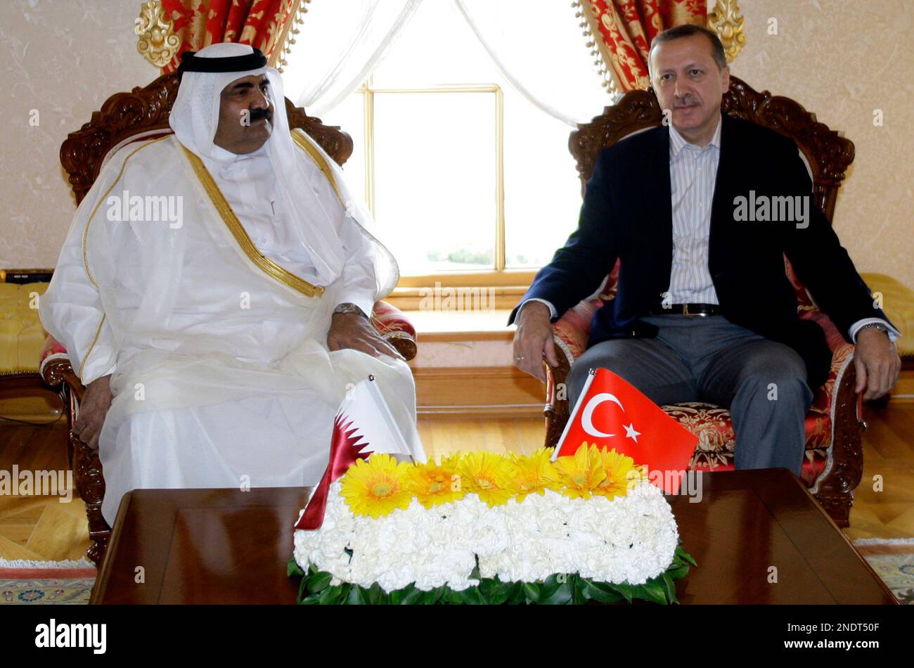 Qatar's Emir Sheik Hamad bin Khalifa Al-Thani, left, and Turkish Prime ...