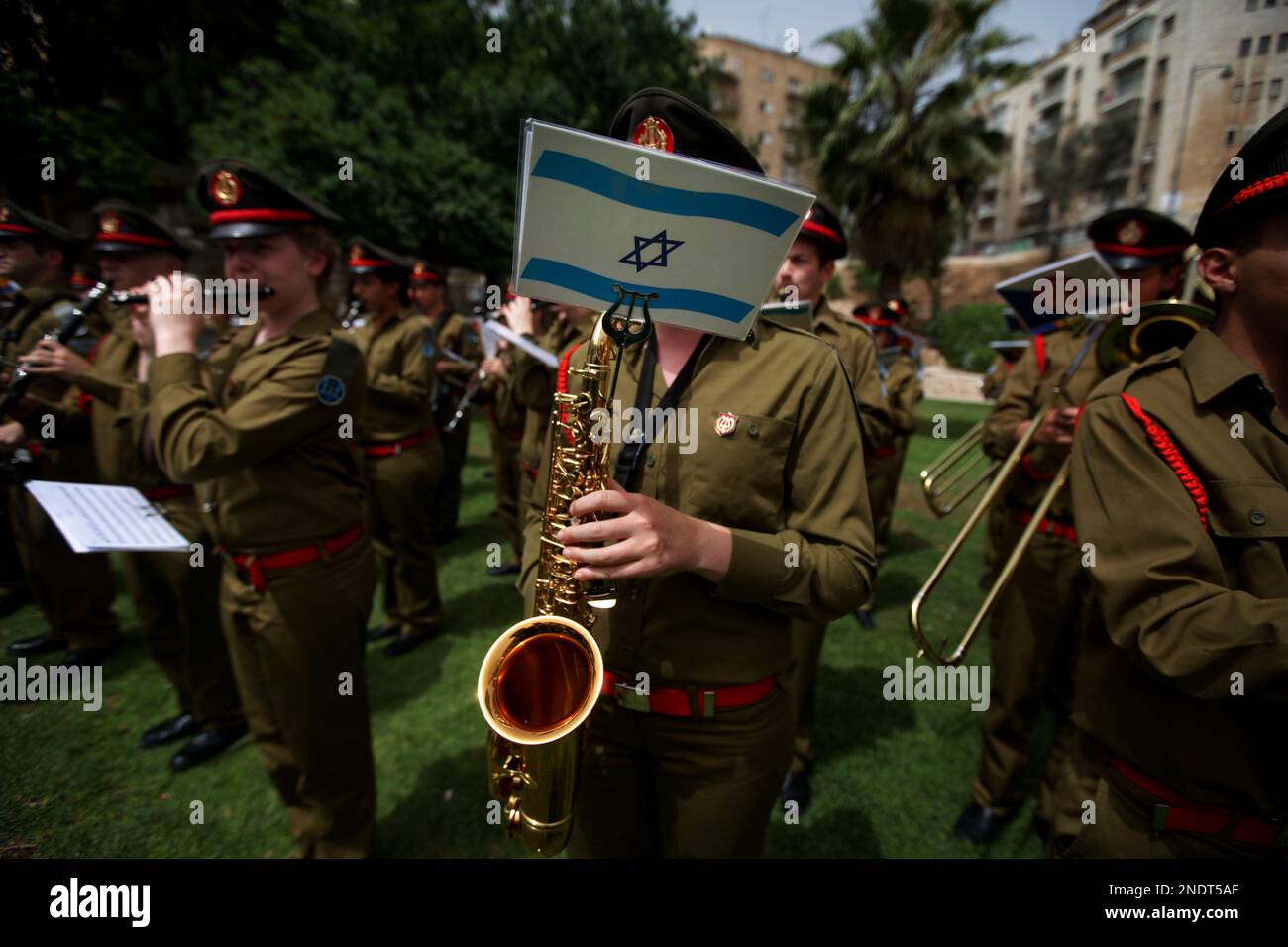 Israeli soldiers play in a band before marching in a street parade ...