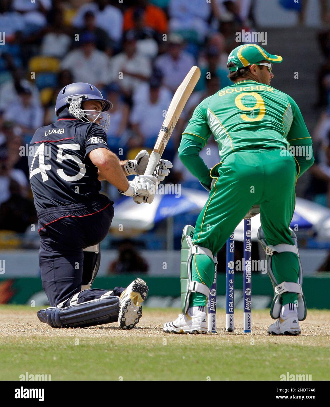 England's opener Michael Lumb, left, and South Africa's wicket keeper ...