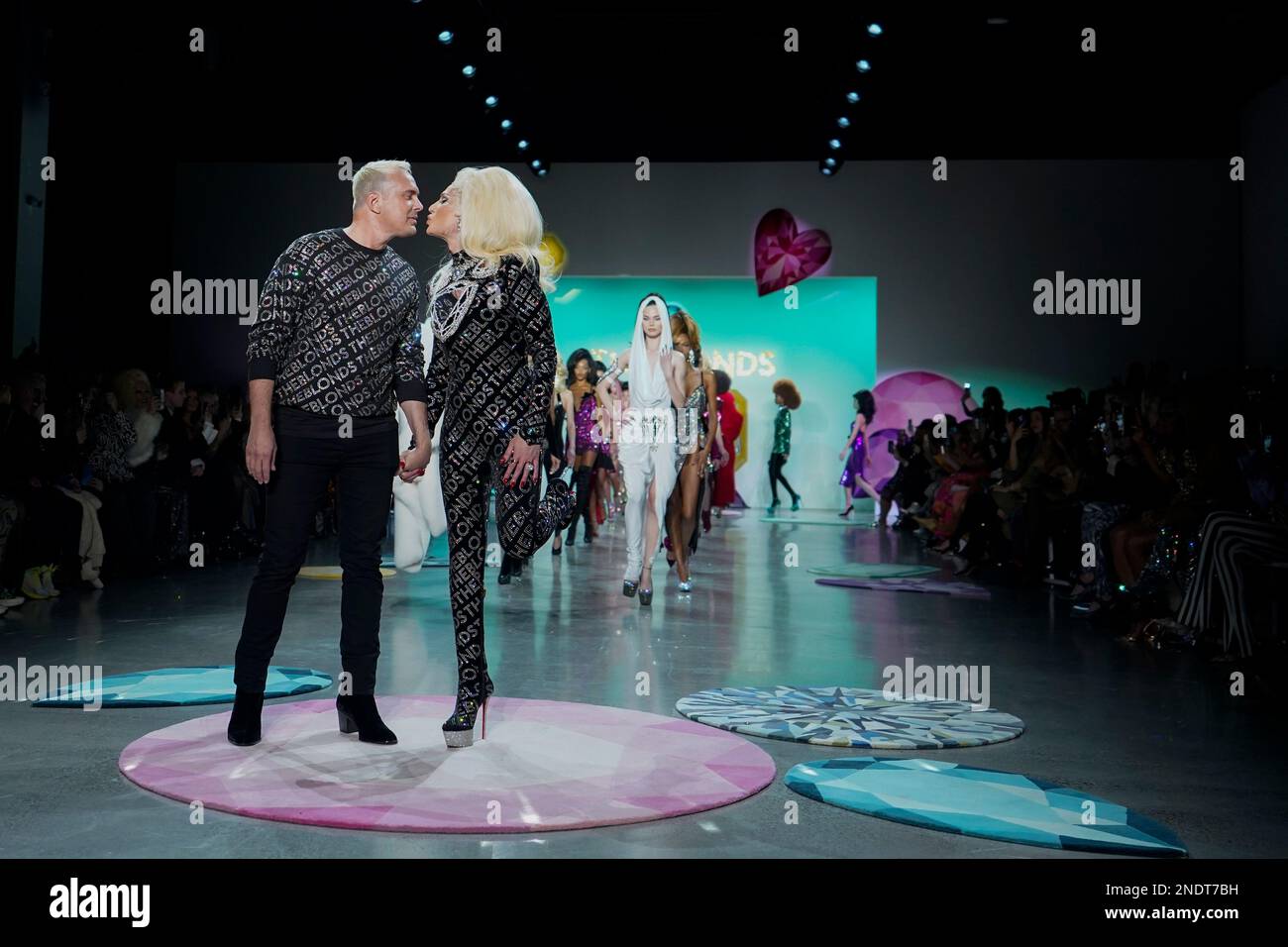 The Blonds designers David Blond, left, and Phillipe Blond kiss on the ...
