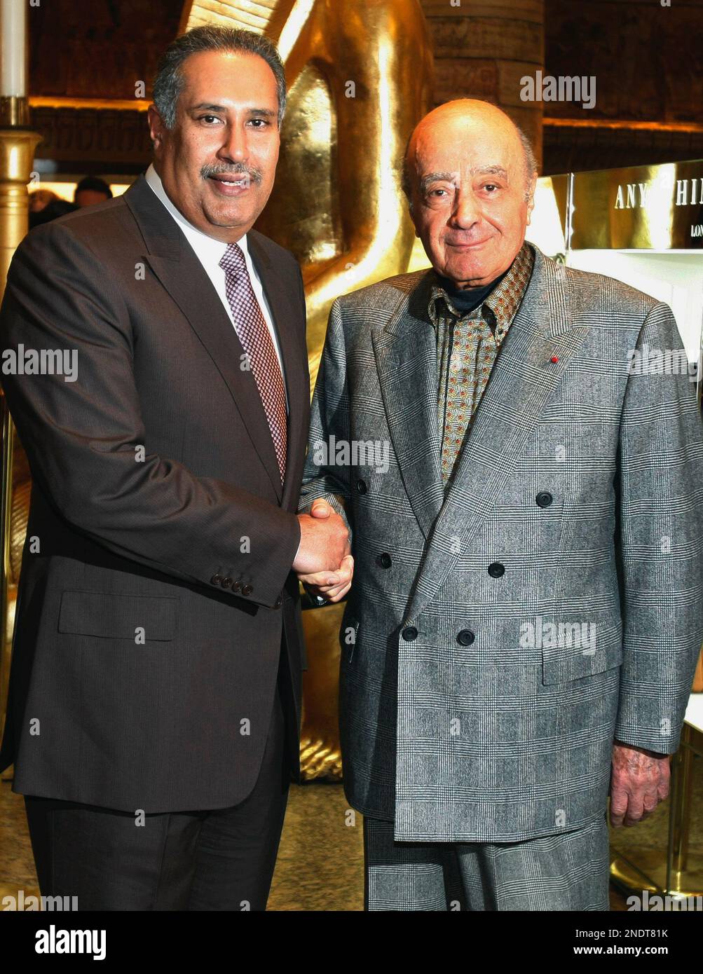Mohamed Al Fayed, right, former owner of Harrods department store with ...