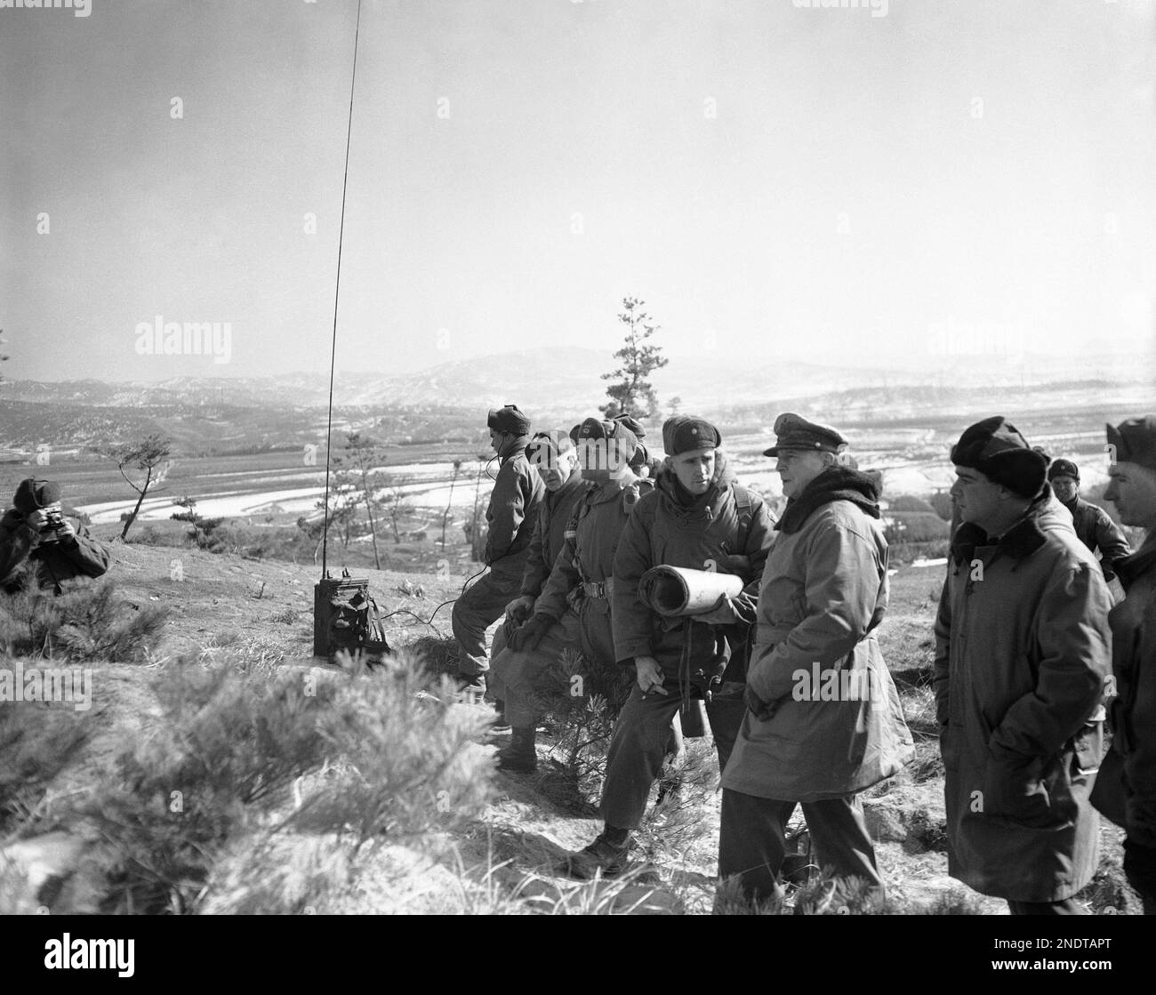 General Douglas MacArthur (second from right), looks over the UN ...