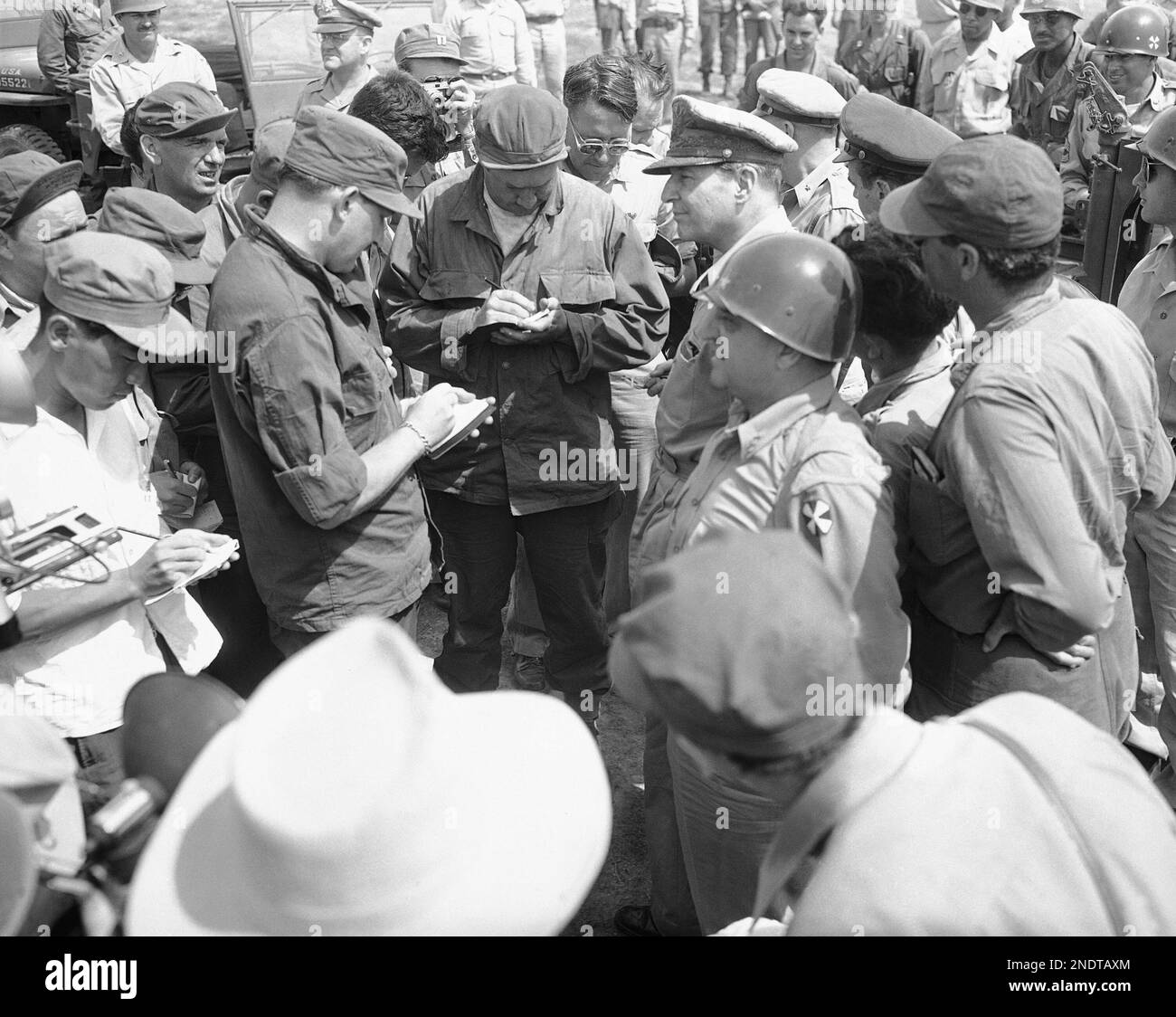 Gen. Douglas MacArthur holds a press conference with war correspondents ...