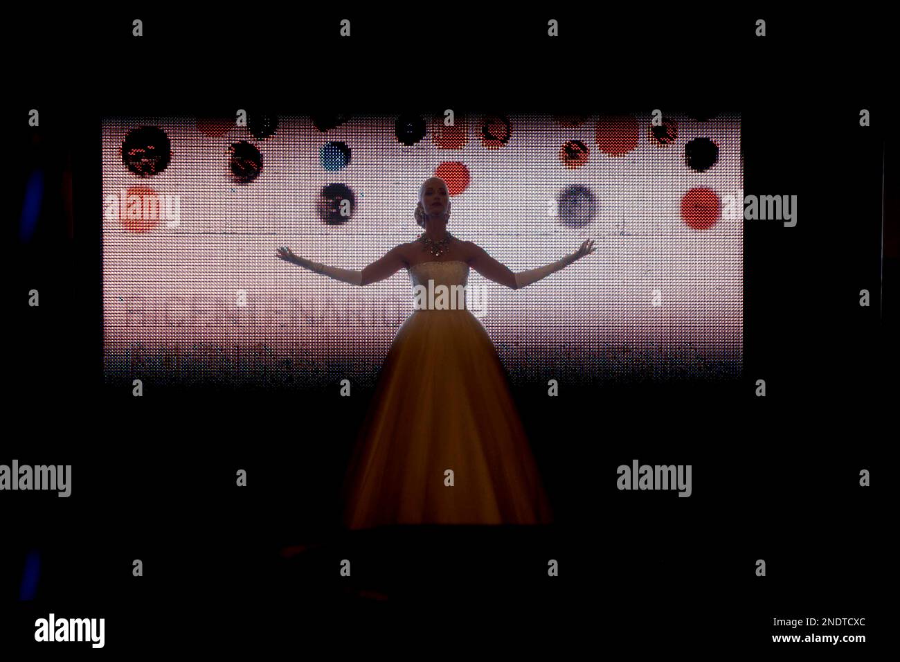 A model, performing as late Argentina's leader Eva Peron, walks the ...