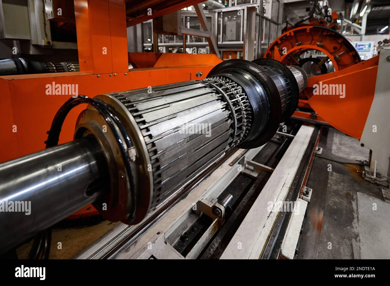 Long shaft with rubber workpieces during tire forming cycle Stock Photo ...