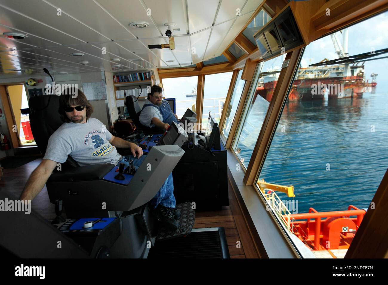 Capt. Demi Shaffer, foreground, and Sean Weichel, dynamic position ...