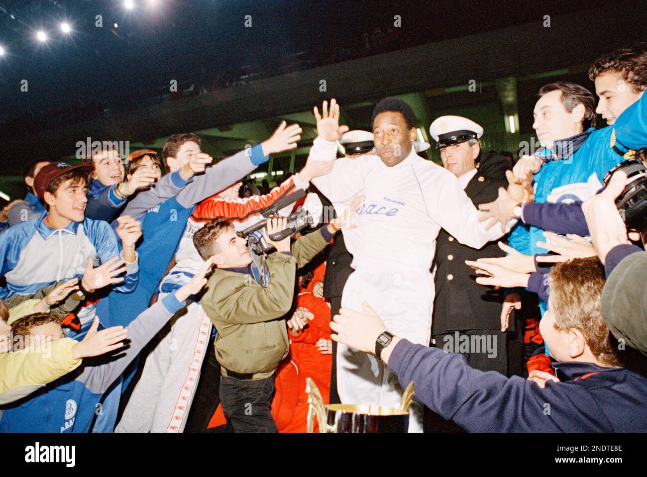 Brazilian soccer star “Pele” with fans while he is entering the Meazza ...