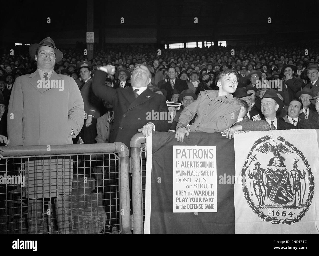 Mayor Fiorello LaGuardia throws out ball at Giants-Brooklyn game on ...