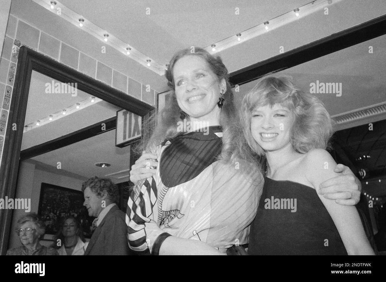 Actress Liv Ullmann hugs her daughter Linn, 16, as they prepare to ...