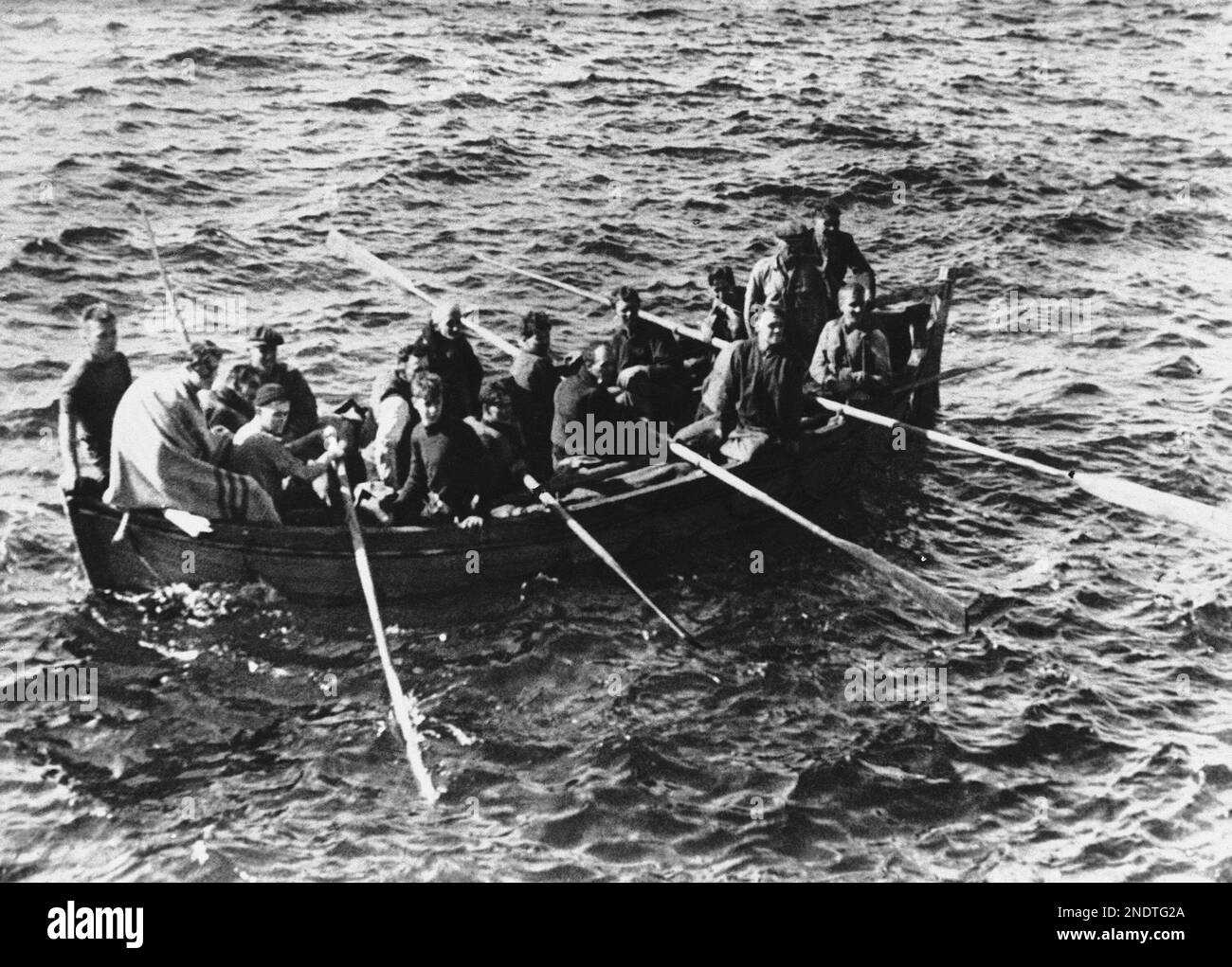 The crew of anAllied merchantman which took to a lifeboat after their ...