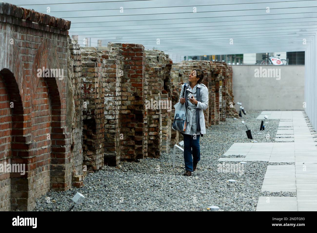 A woman inspects original remains of the historical Gestapo and SS ...