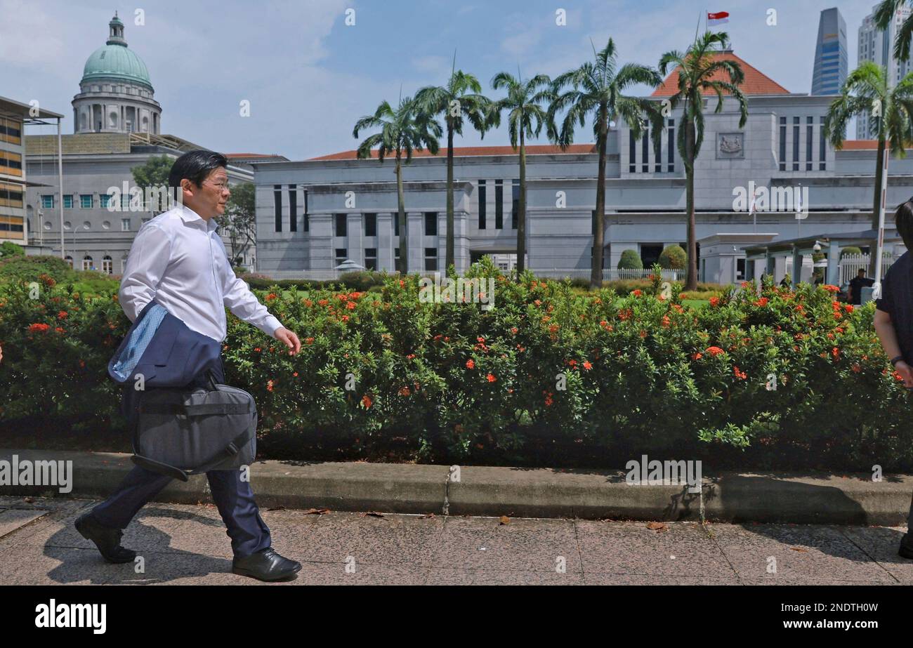 Deputy Prime Minister and Finance Minister Lawrence Wong making his way ...