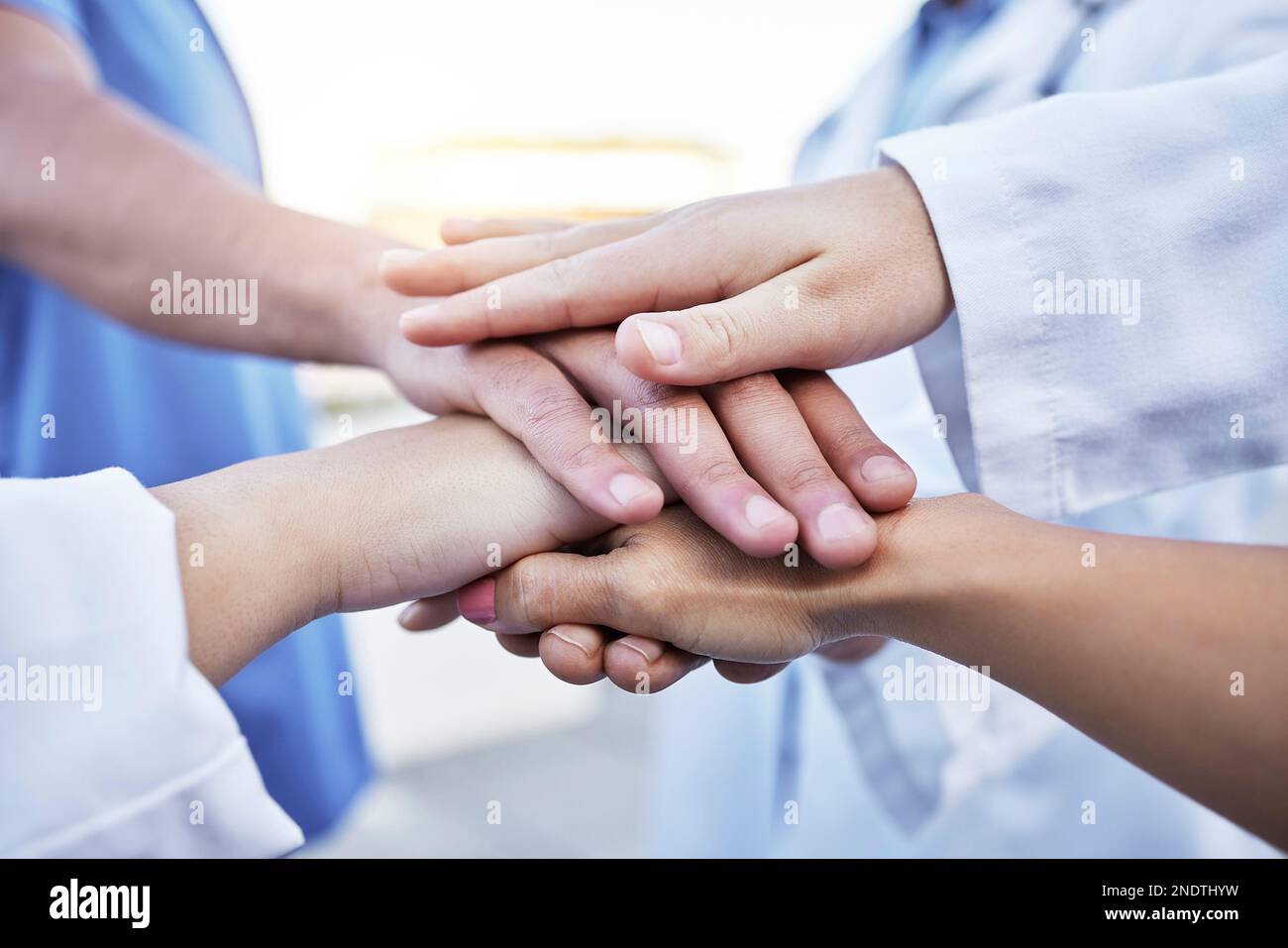 Healthcare, motivation and hands of doctors for support, partnership ...