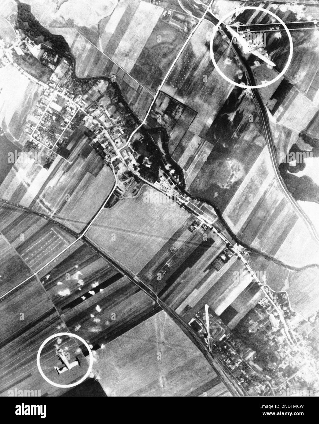 Circles indicate two parts of a B-24 Liberator bomber of the 15th U.S ...