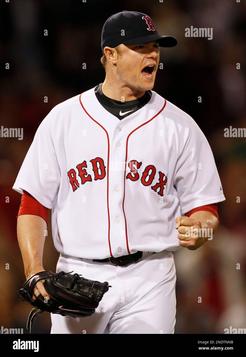 Boston Red Sox starting pitcher Jon Lester pumps his fist after a ...