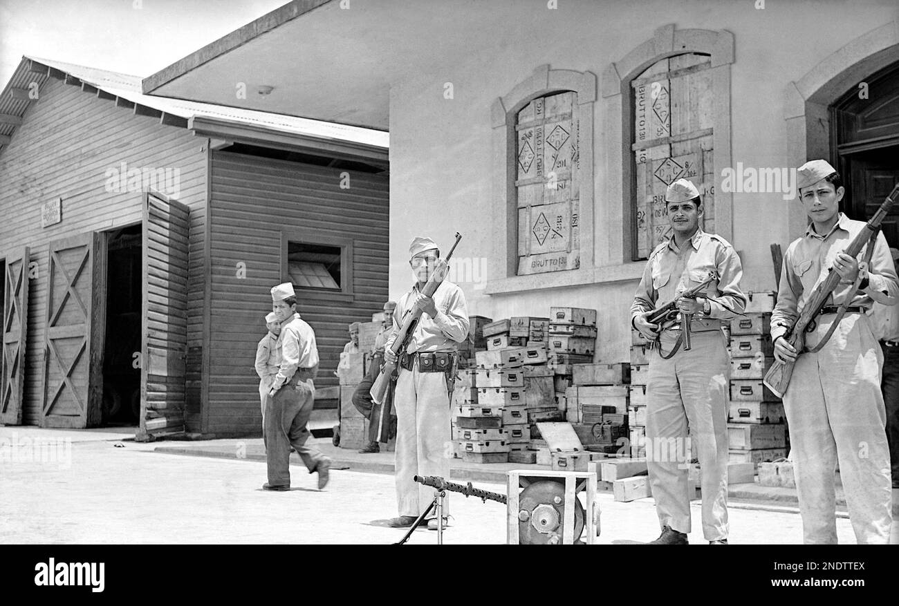 Three soldiers at the Guardia de Honor and barracks in Guatemala City ...