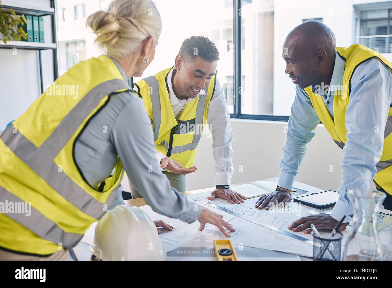 Architect, building and construction team in planning strategy ...