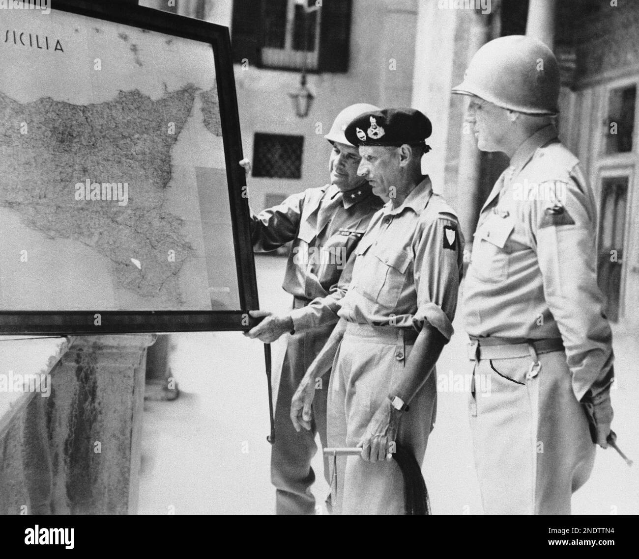 Studying a huge map of Sicily at the Royal Palace in Palermo, Italy on ...