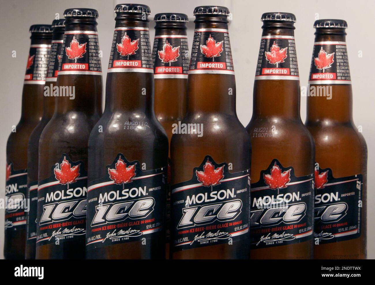 A display of Molson Ice beer sits arranged in a refrigerator in ...