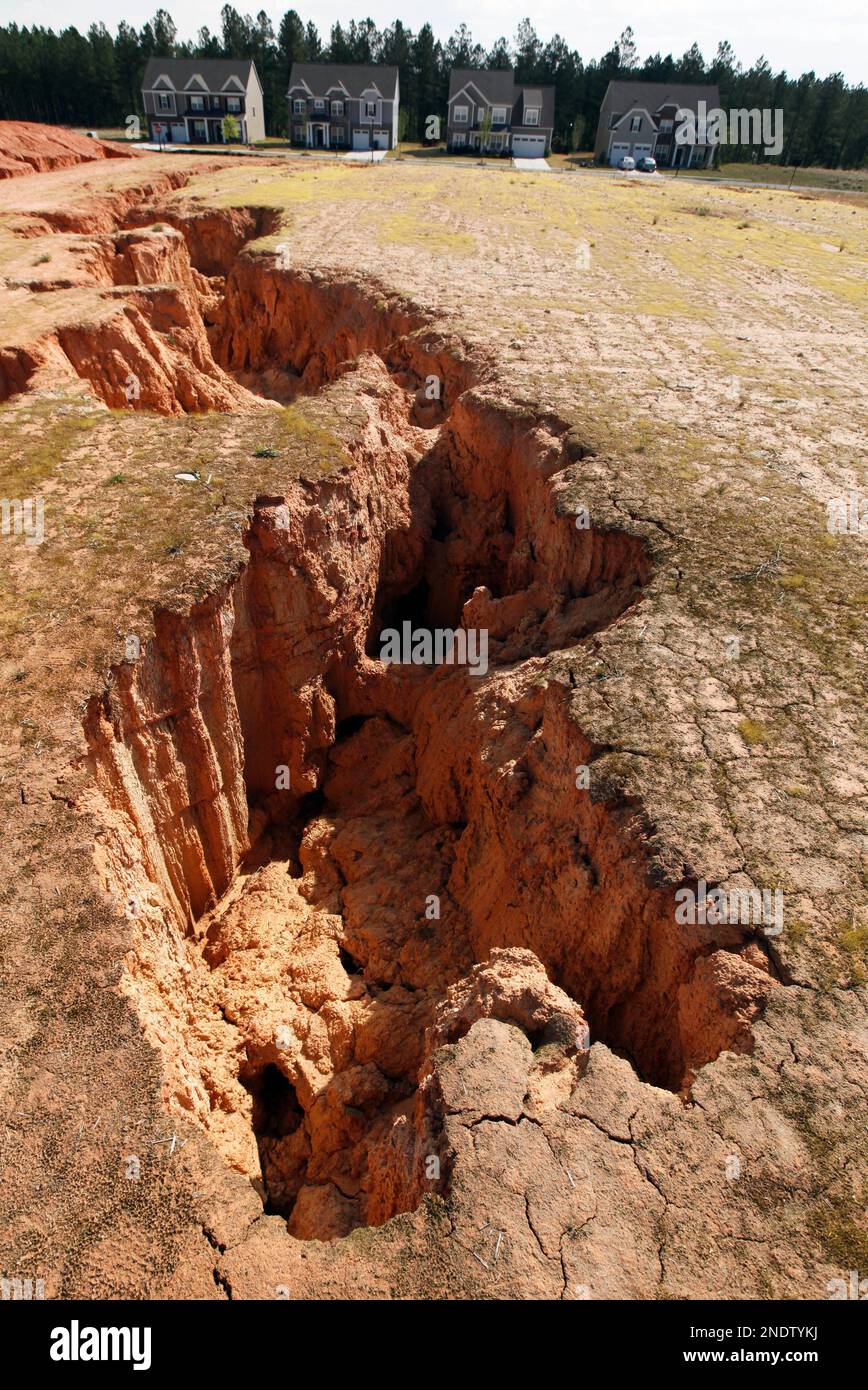 In this April 9, 2010 photo, a large chasm is shown at the Edenmoor ...