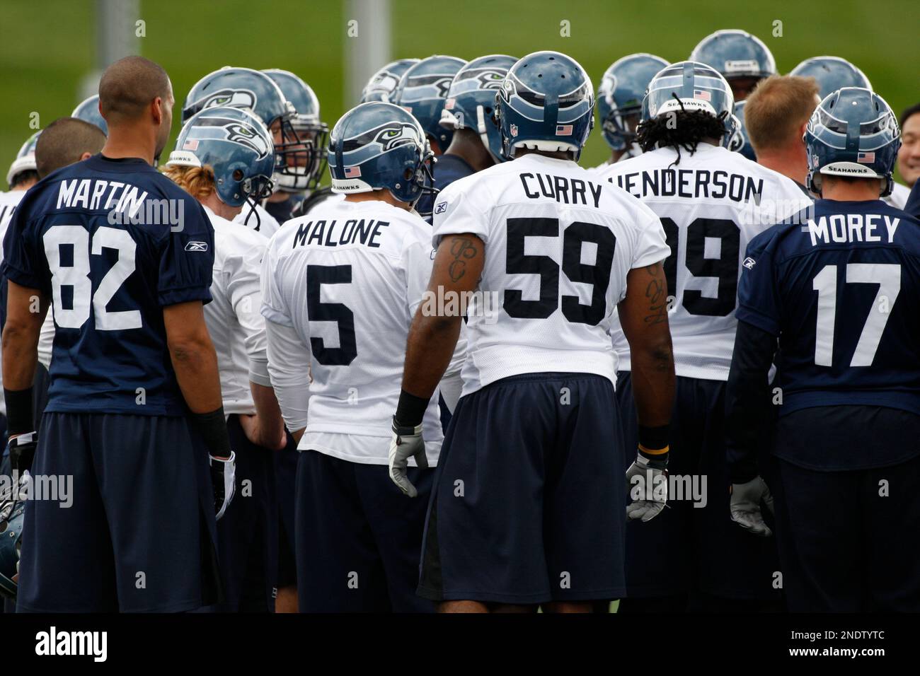 Seattle Seahawks huddle during an NFL football mini-camp, Friday, April ...