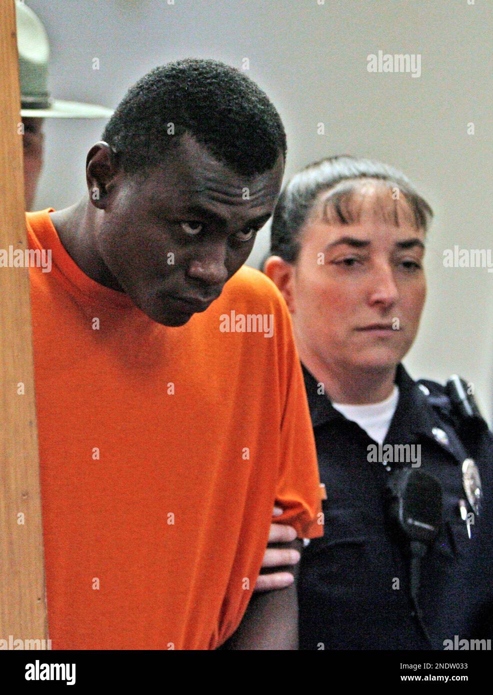 Roody Fleuraguste arrives for his arraignment in district court in ...