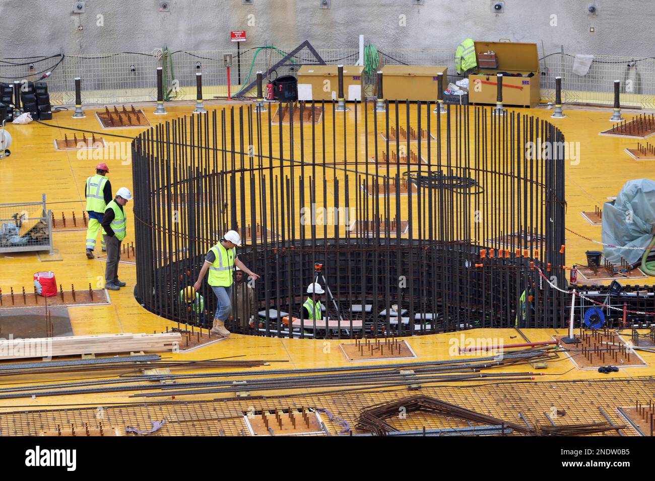 French workers are seen on the construction site of the Jules Horowitz ...