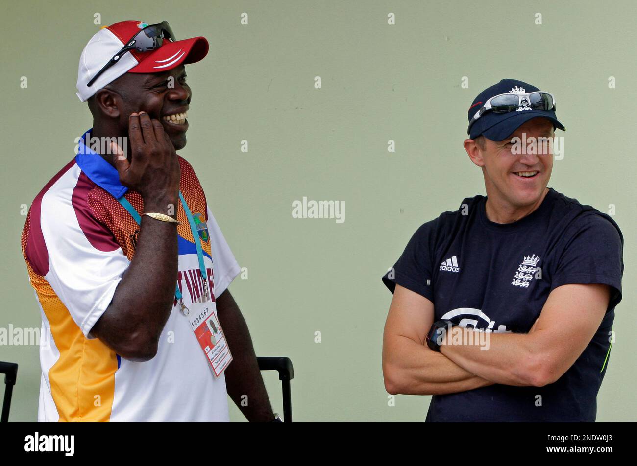 West Indies' cricket coach Ottis Gibson, left, and England's coach Andy ...