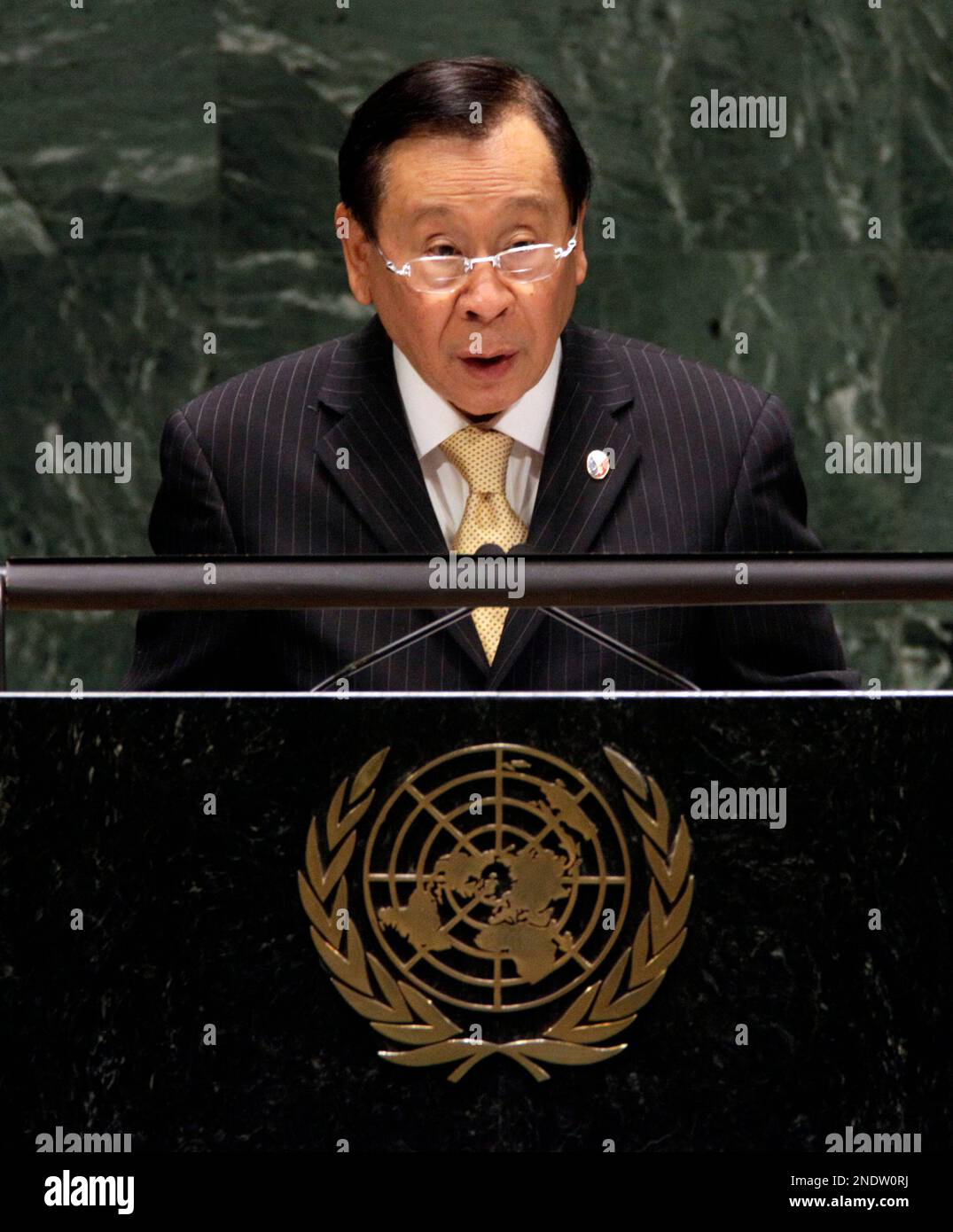 Foreign Secretary Alberto Romulo of the Philippines addresses the ...