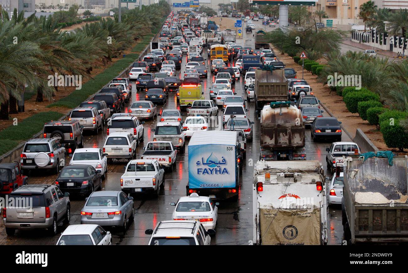 Vehicles are seen in a traffic jam, after a heavy rainstorm flooded ...
