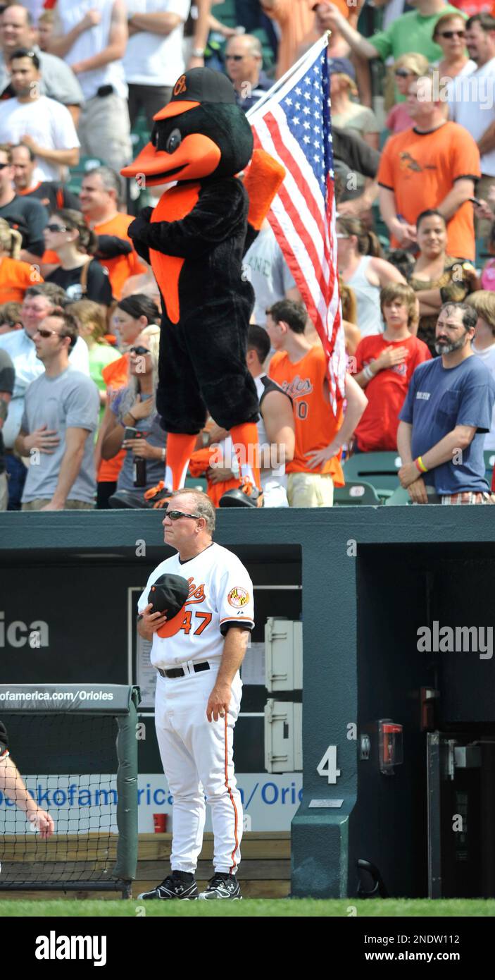 Baltimore Orioles manager Dave Trembley pauses during the singing of ...